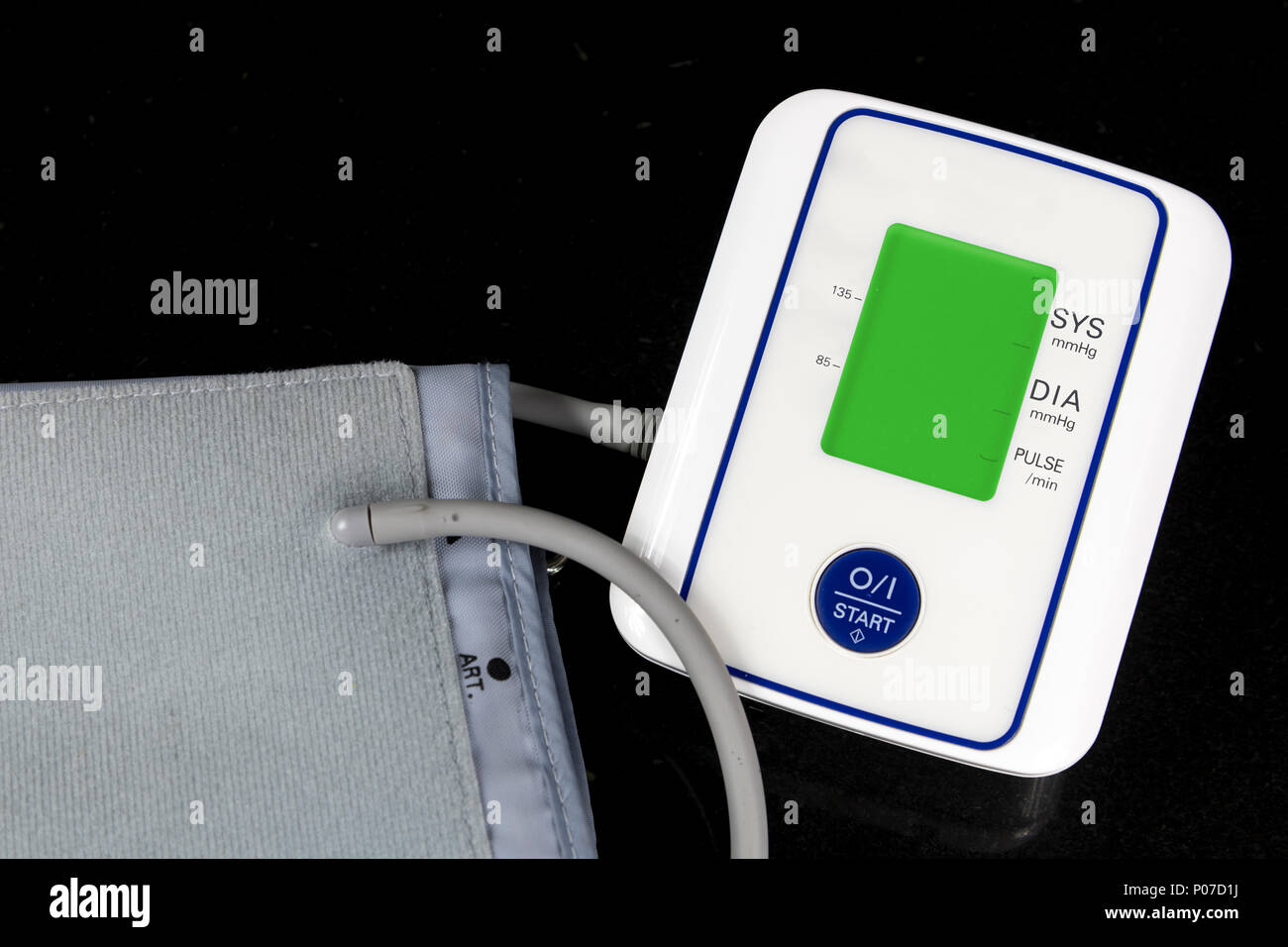 Automatic Blood Pressure Monitor with green screen on black background ...