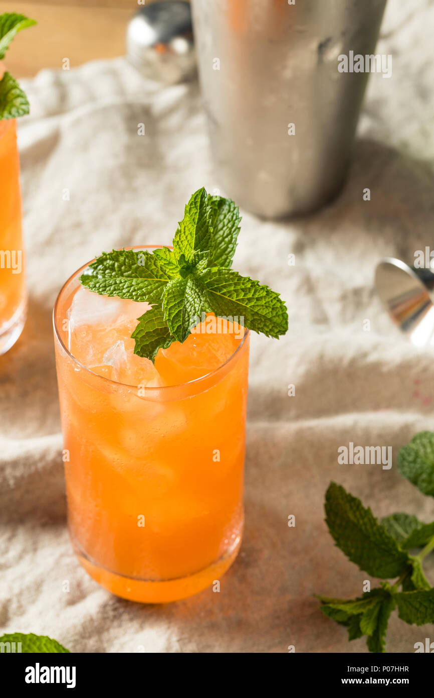 Sweet Tropical Zombie Cocktail with Rum and Mint Stock Photo - Alamy