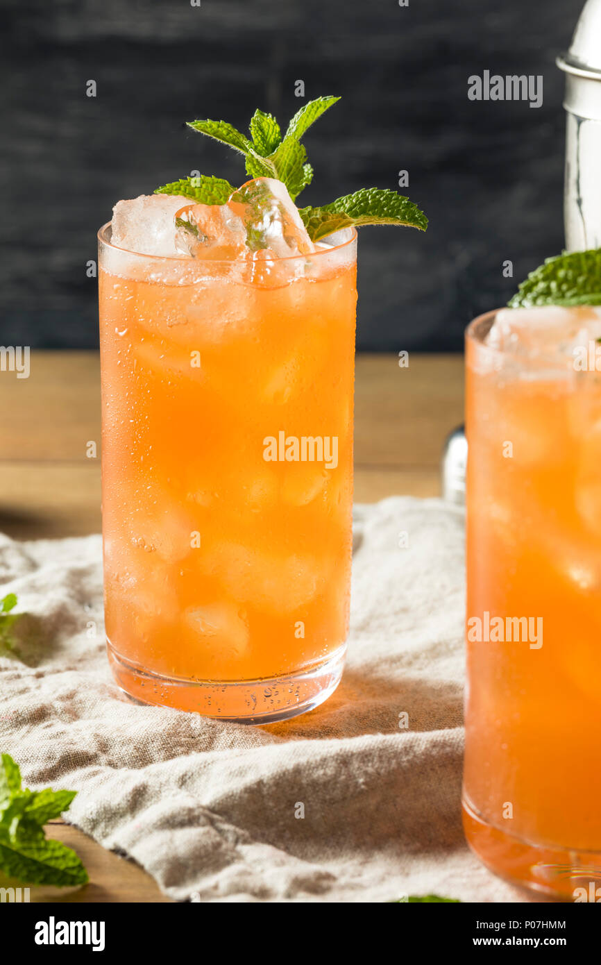 Sweet Tropical Zombie Cocktail with Rum and Mint Stock Photo - Alamy