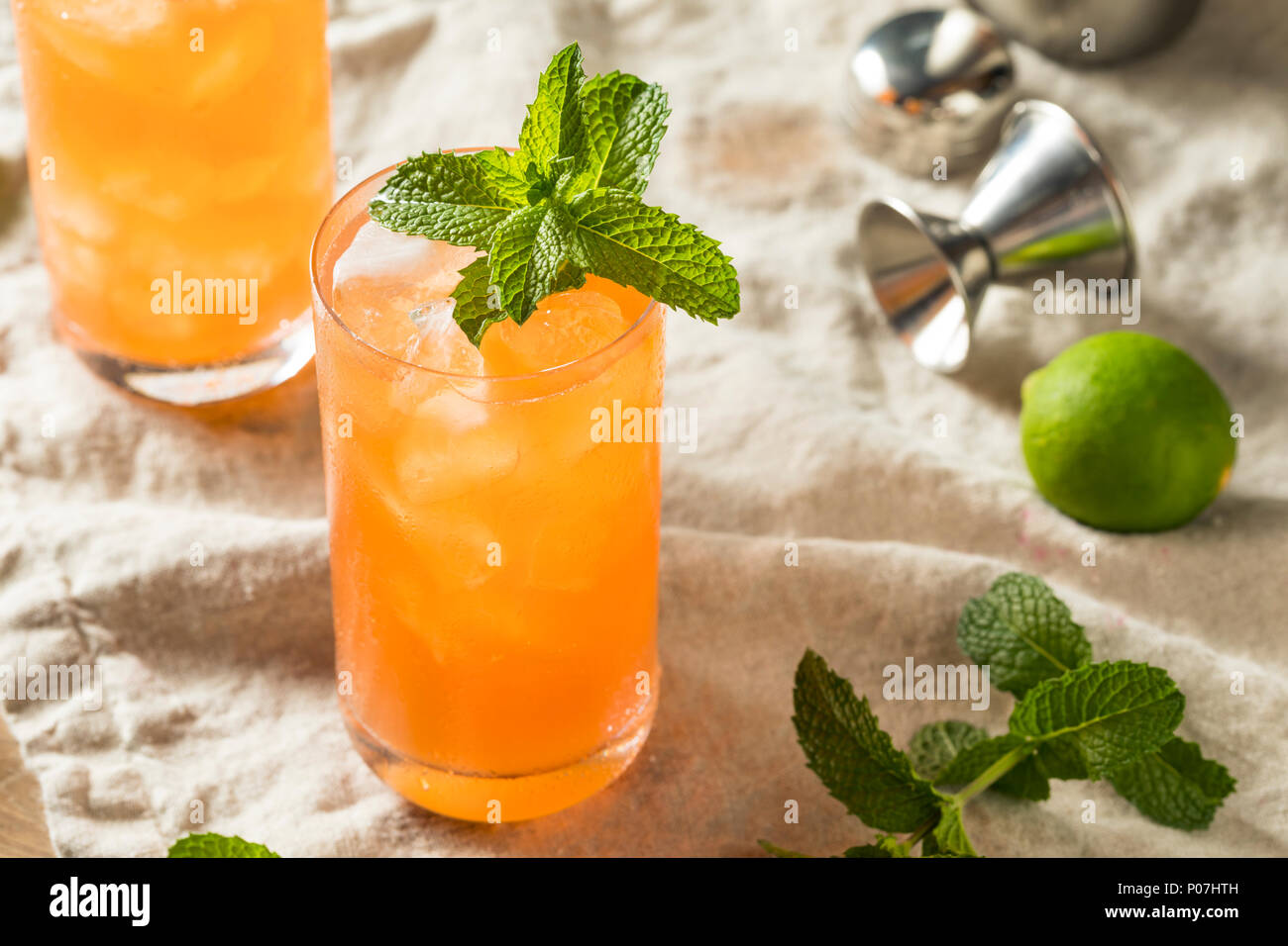 Sweet Tropical Zombie Cocktail with Rum and Mint Stock Photo - Alamy