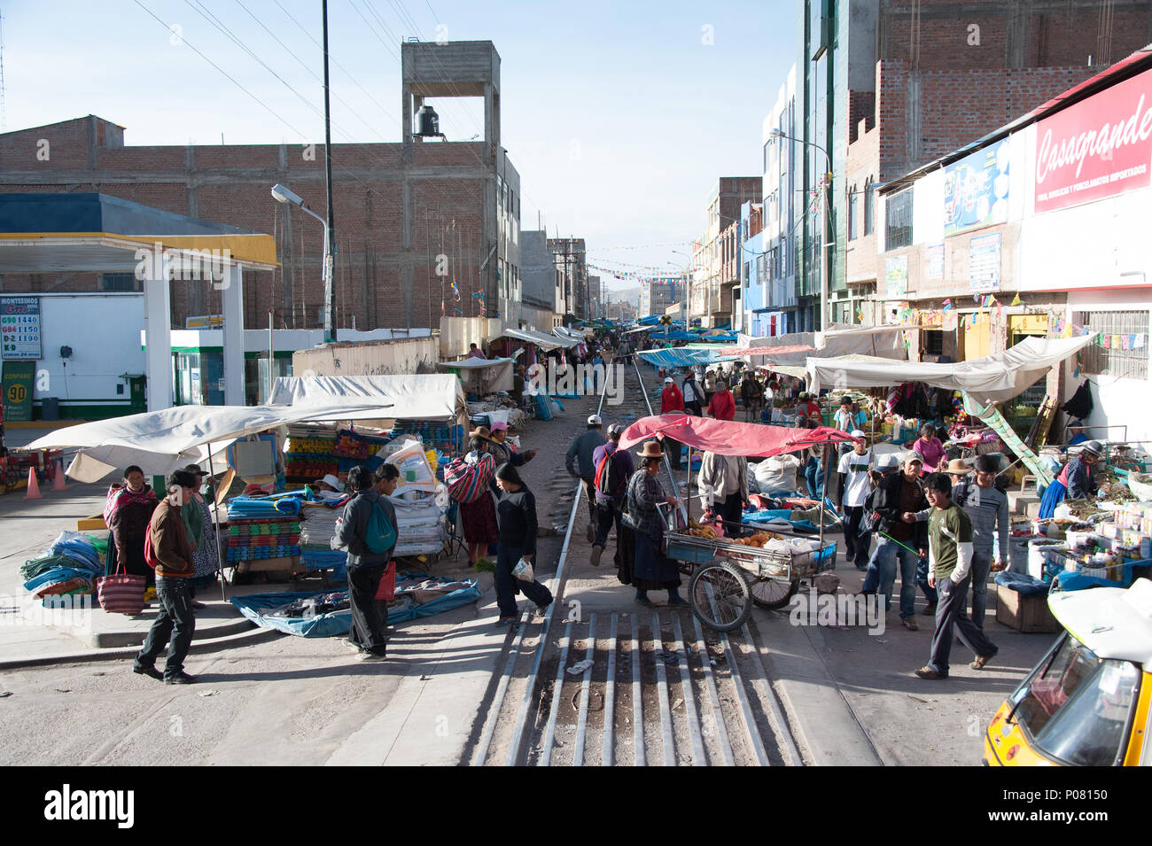Street photography showing the journey through the market town of ...