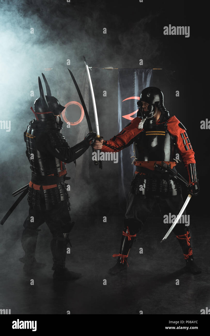 samurai in traditional greeting each other on black Stock Photo - Alamy