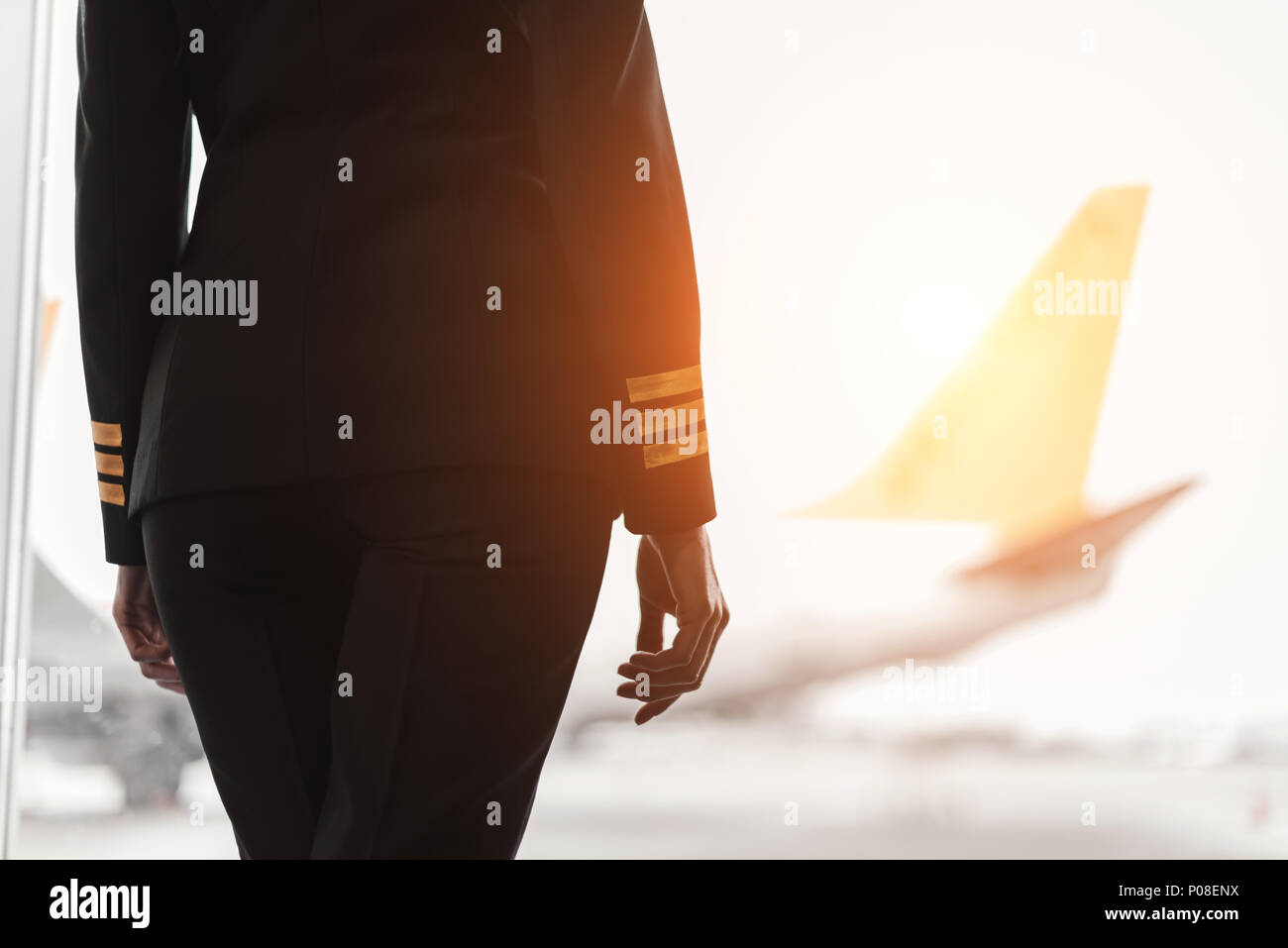 Female airport worker airplane hi-res stock photography and images - Alamy