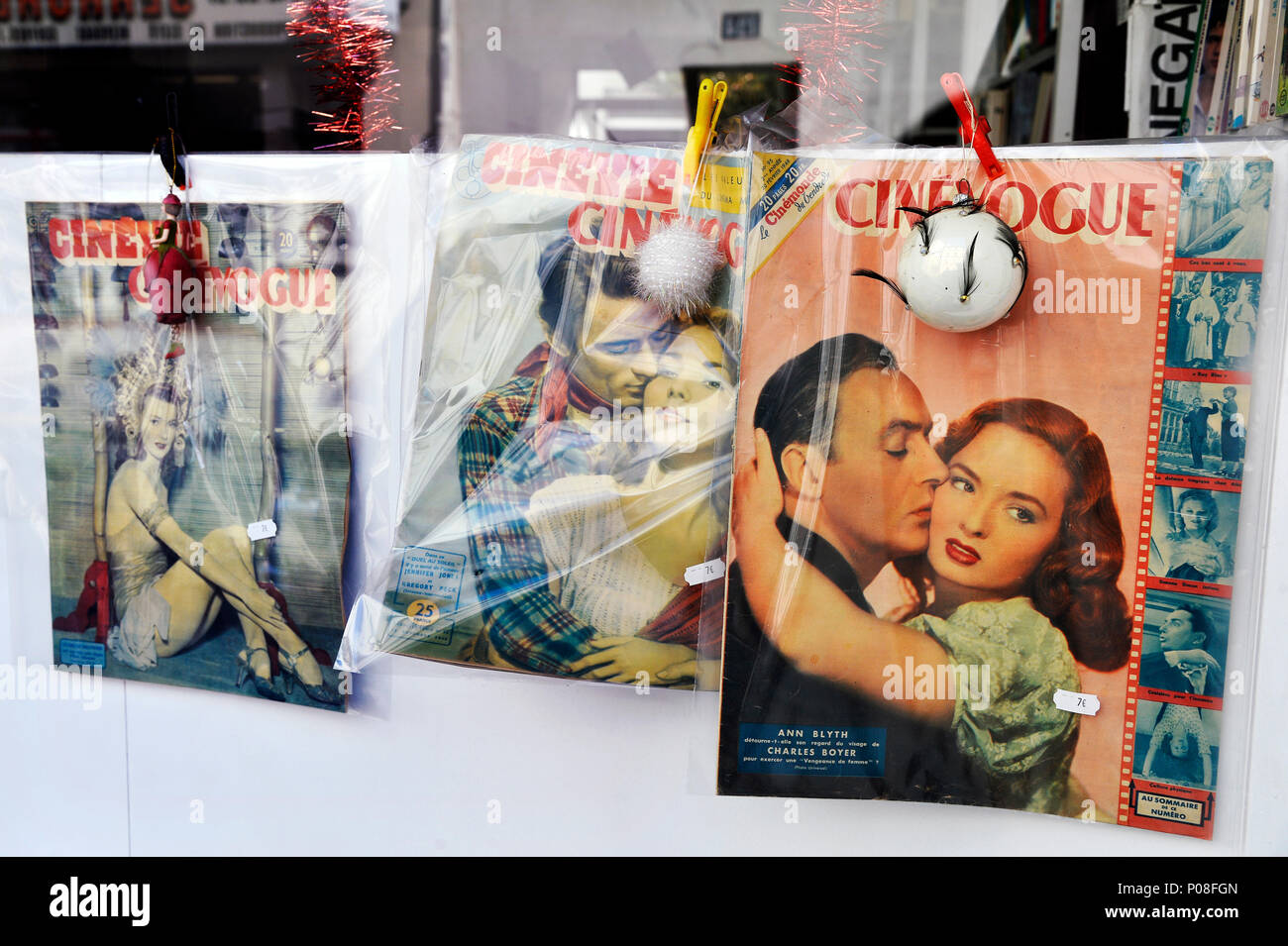 Vintage magazines in a shop window - Paris - France Stock Photo - Alamy
