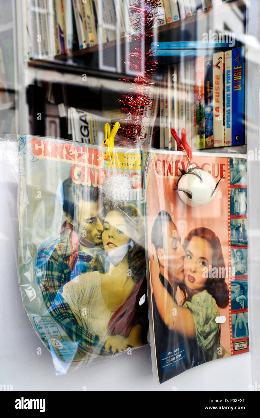 Vintage magazines in a shop window - Paris - France Stock Photo - Alamy