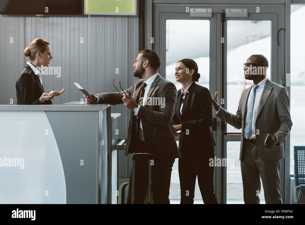 Angry women airport counter hi-res stock photography and images - Alamy