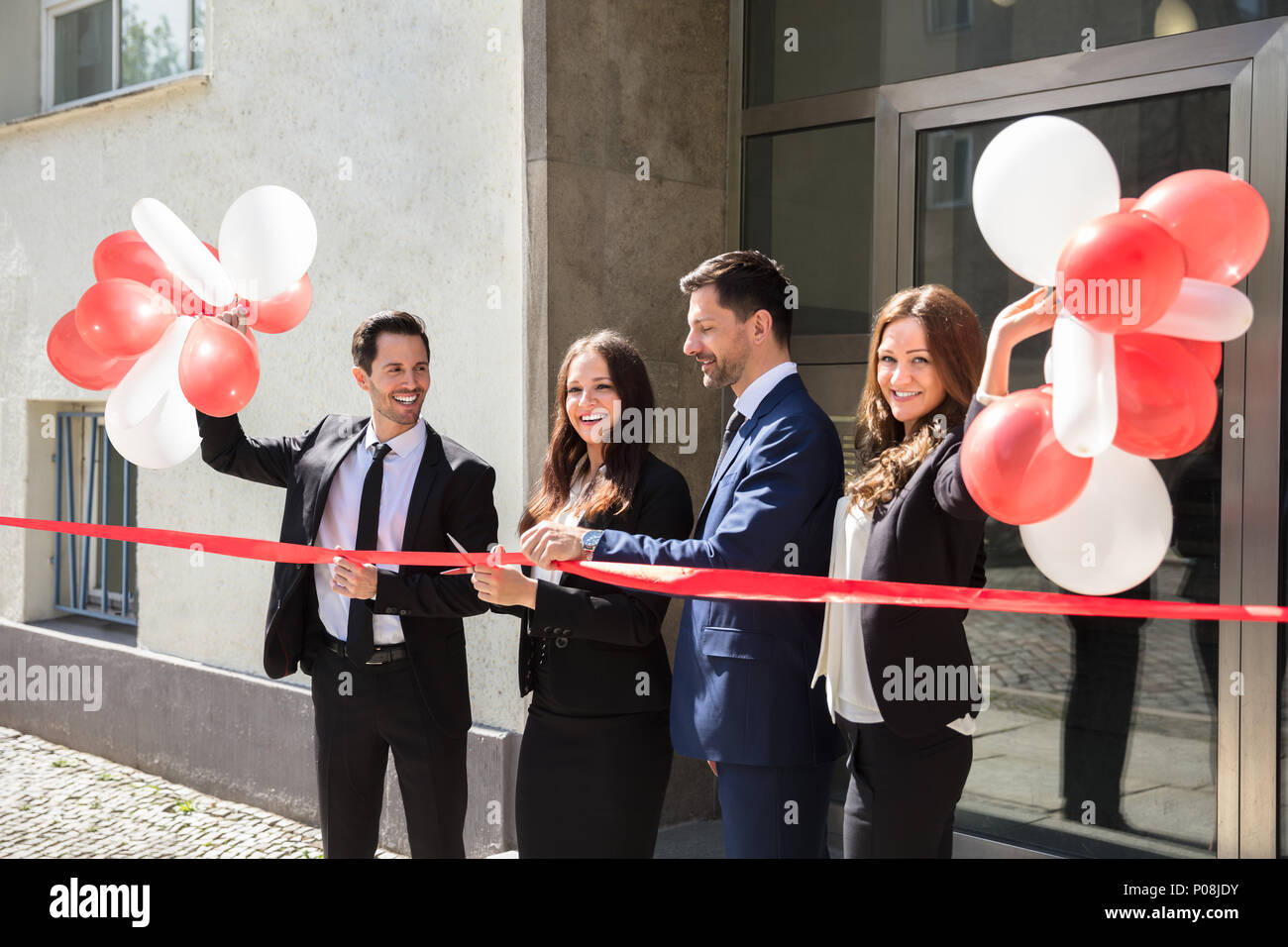 Ribbon cutting ceremony building hi-res stock photography and images ...