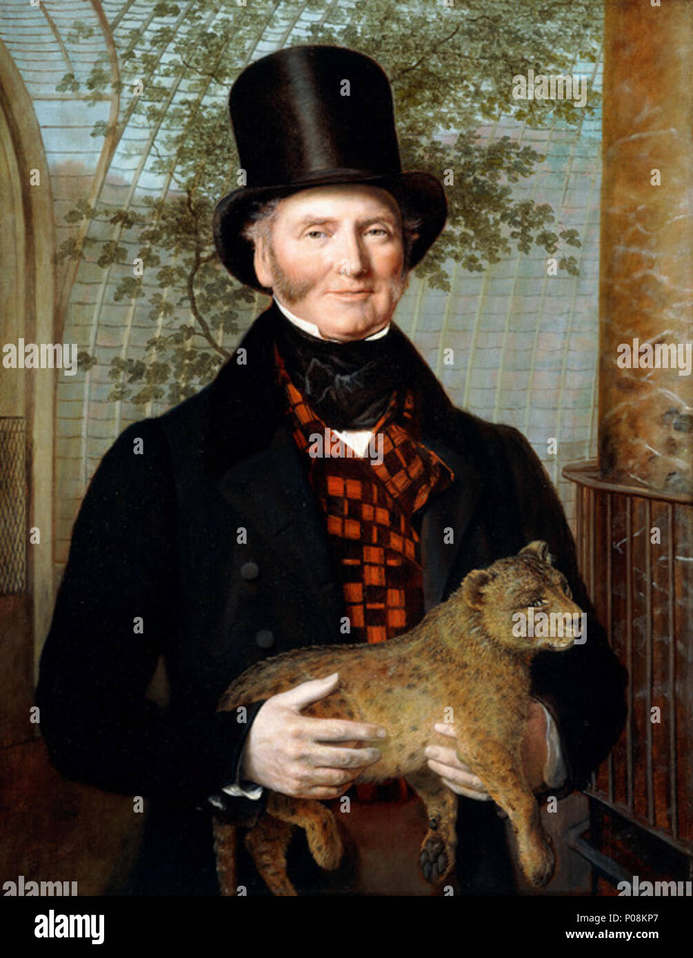 Man holding baby lion hi-res stock photography and images - Alamy