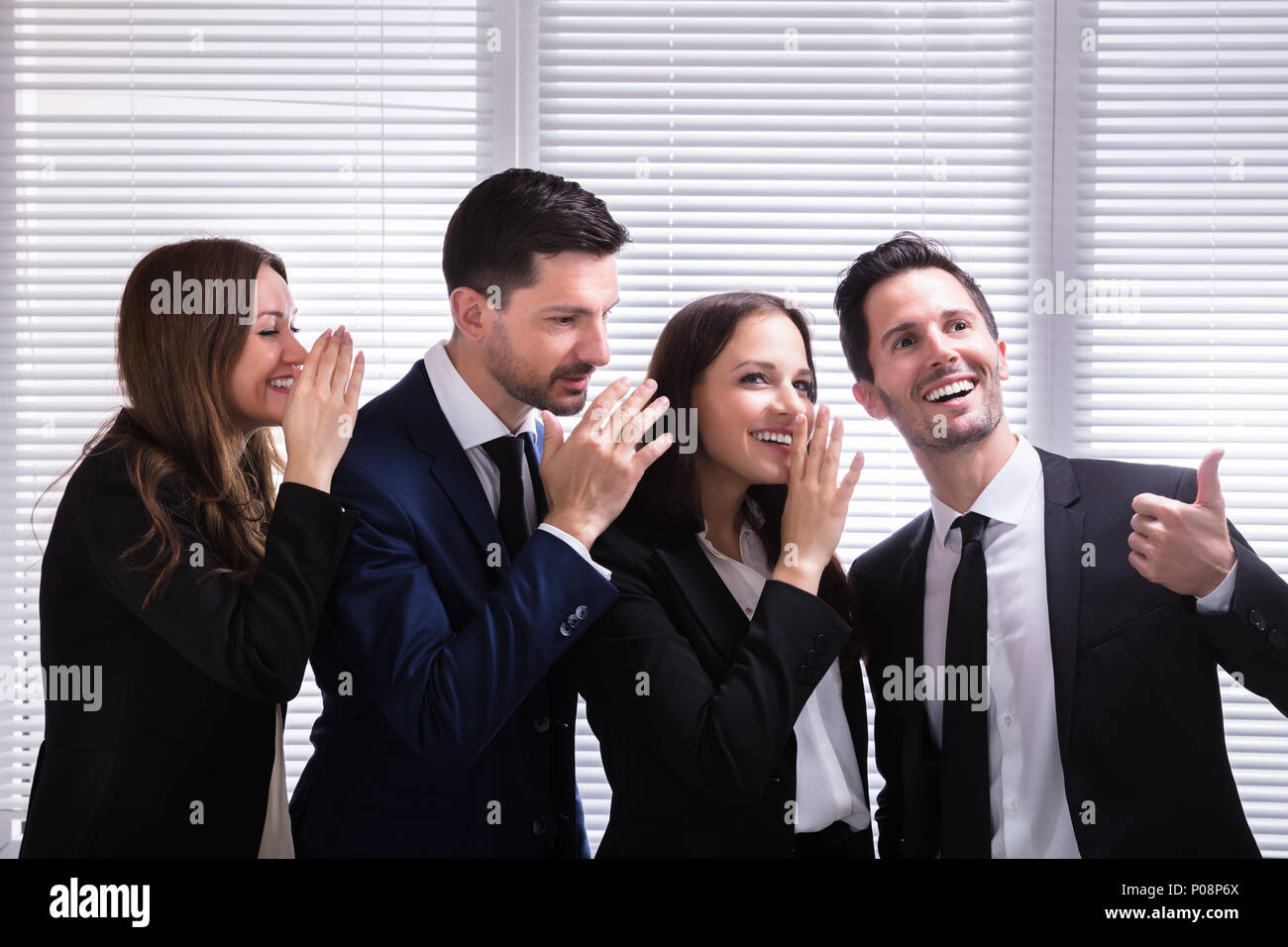 Whisper ear suit hi-res stock photography and images - Alamy