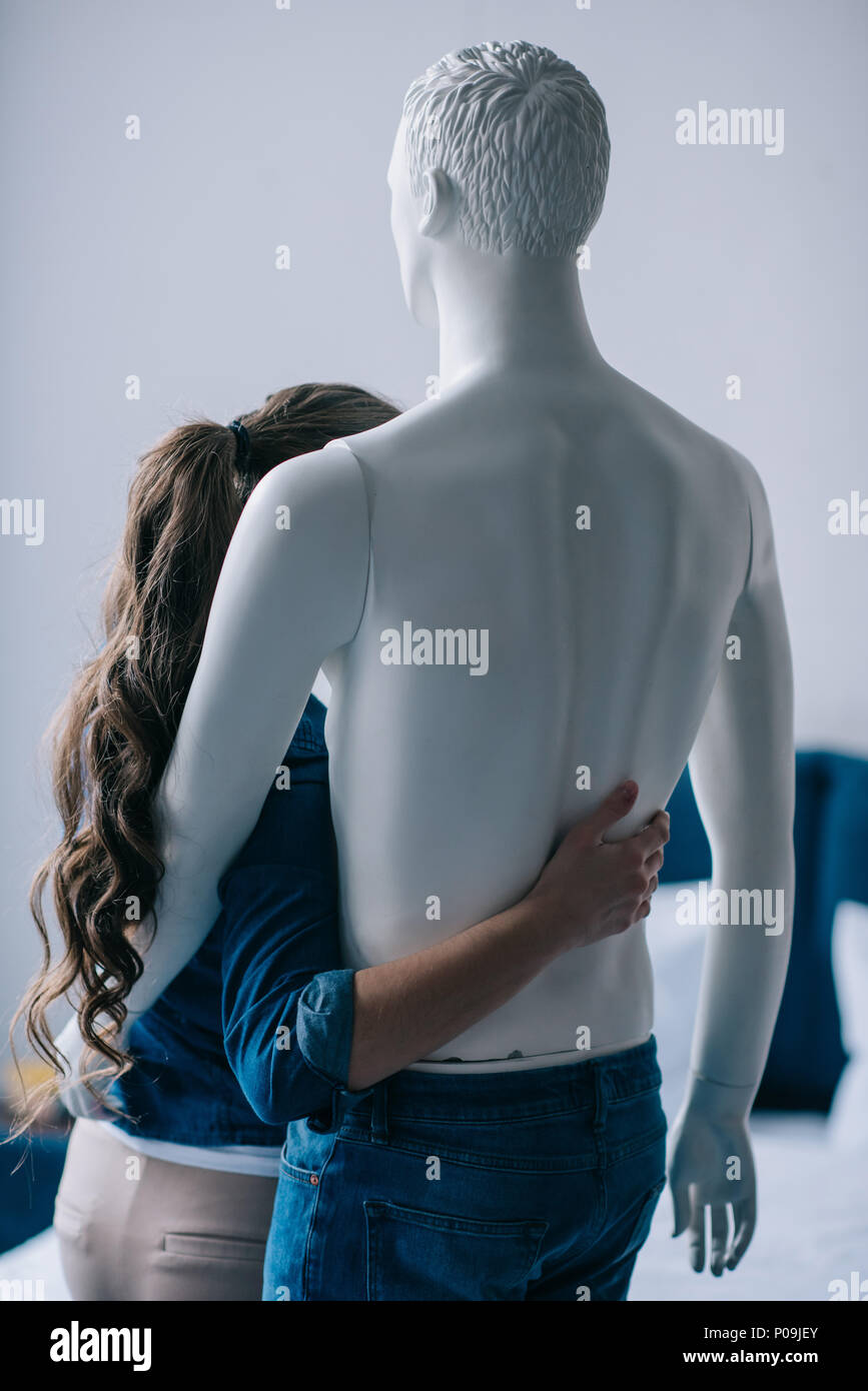 Woman hugging mannequin hi-res stock photography and images - Alamy