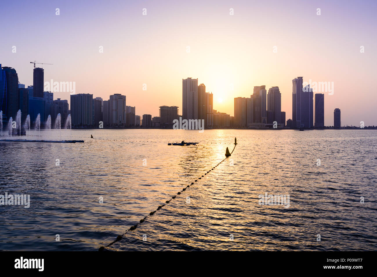Panoramic sunset view of Sharjah waterfront cityscape in UAE Stock ...