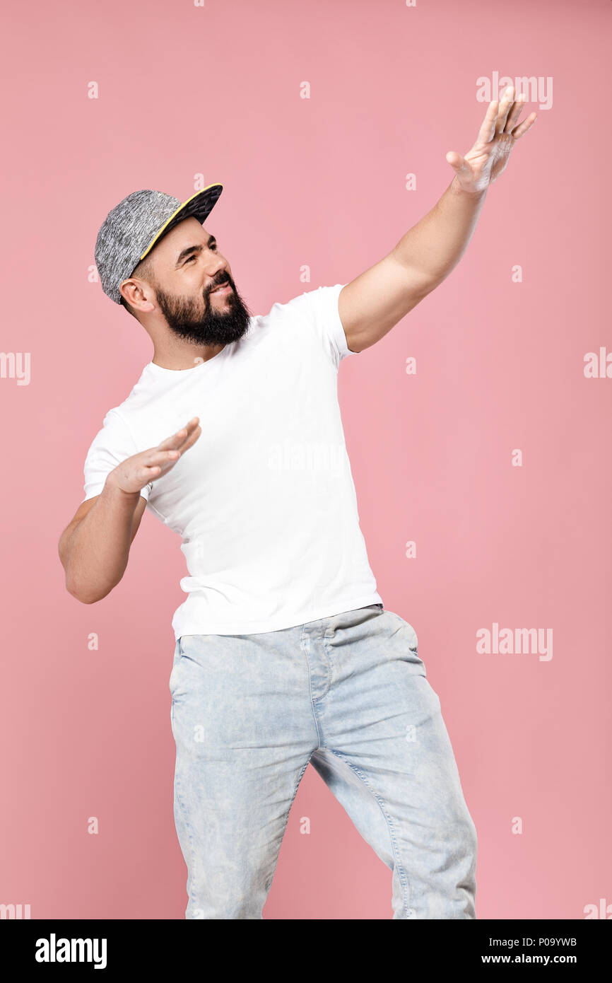 bearded man in cap dancing Stock Photo - Alamy