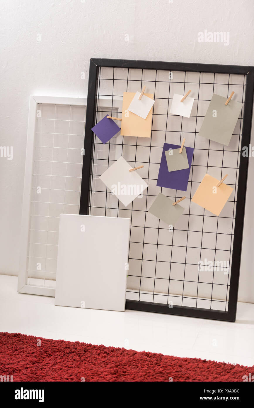 notes and papers on boards in fashionable modern office Stock Photo - Alamy