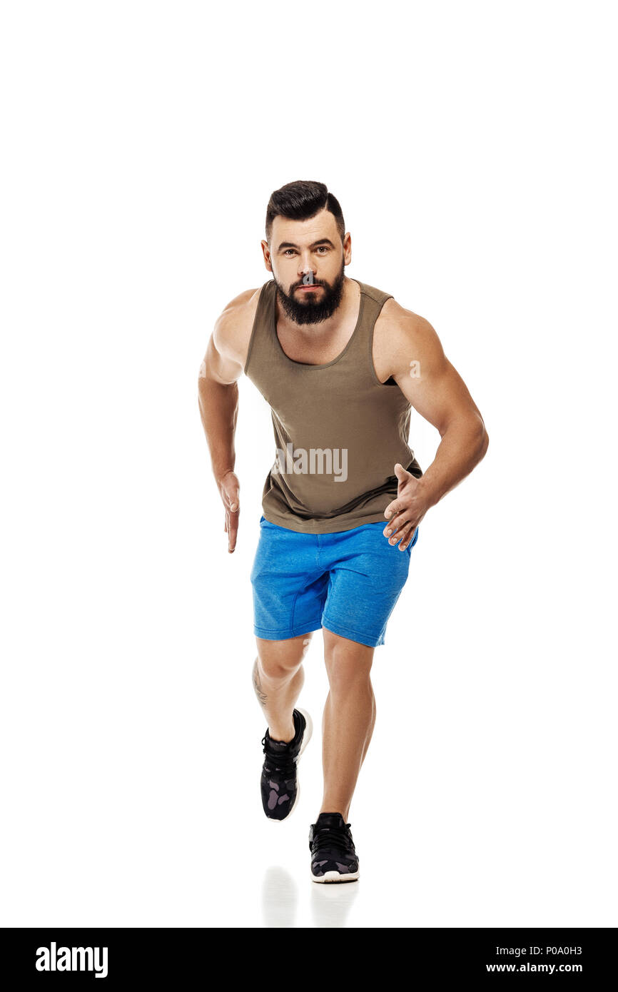 man running forward on white background Stock Photo - Alamy