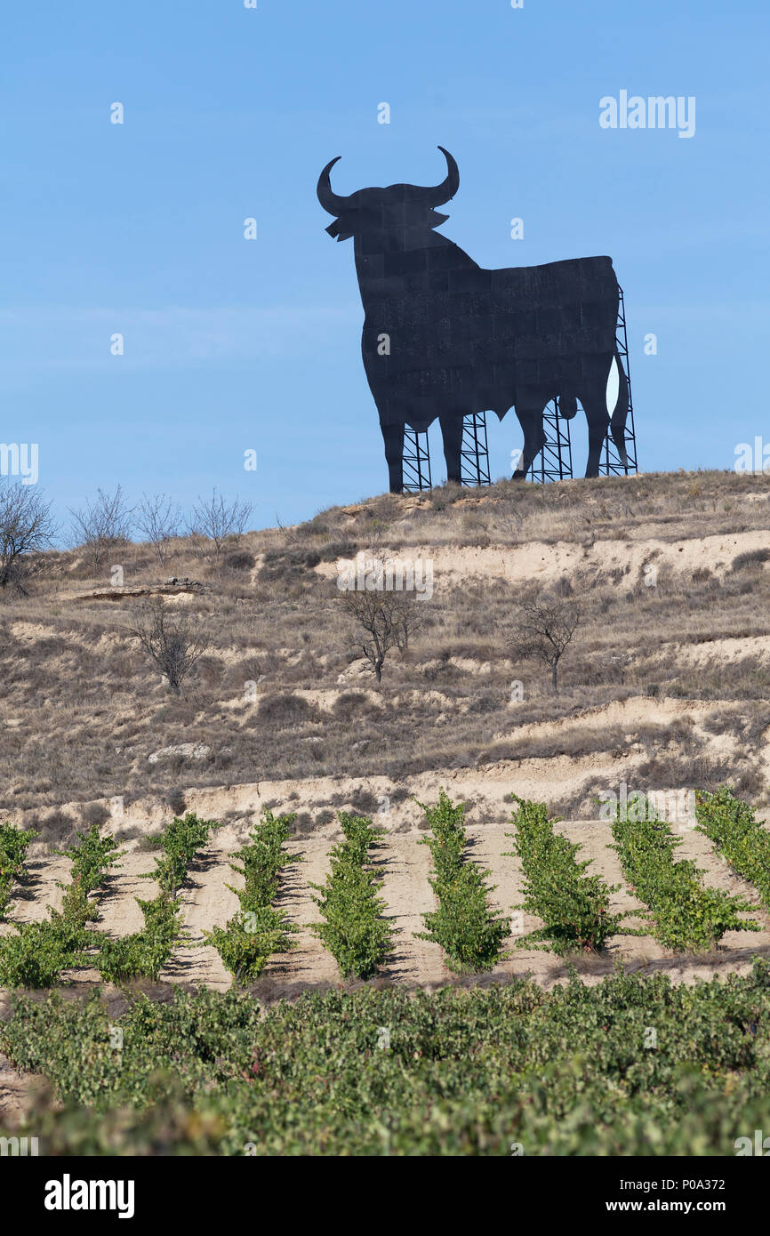Statue of black bull on ridge above vineyards in the Briones area in La ...