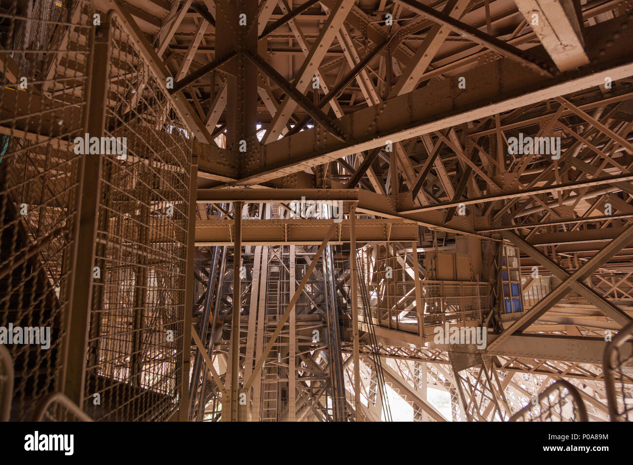 Metal lattice work stairs between the first floor and ground level ...