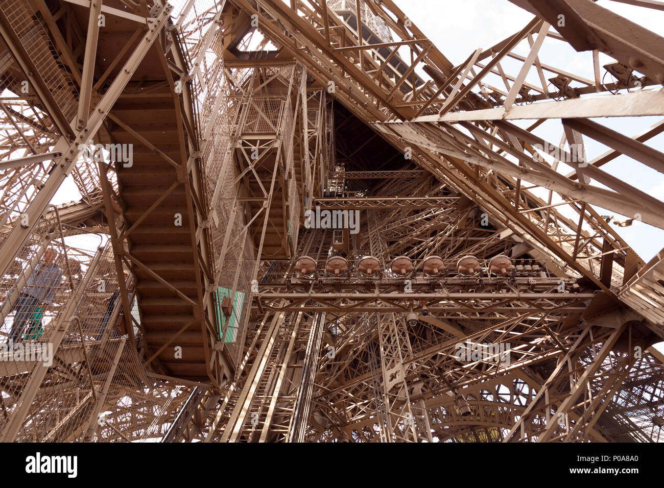 Metal lattice work stairs between the first floor and ground level ...