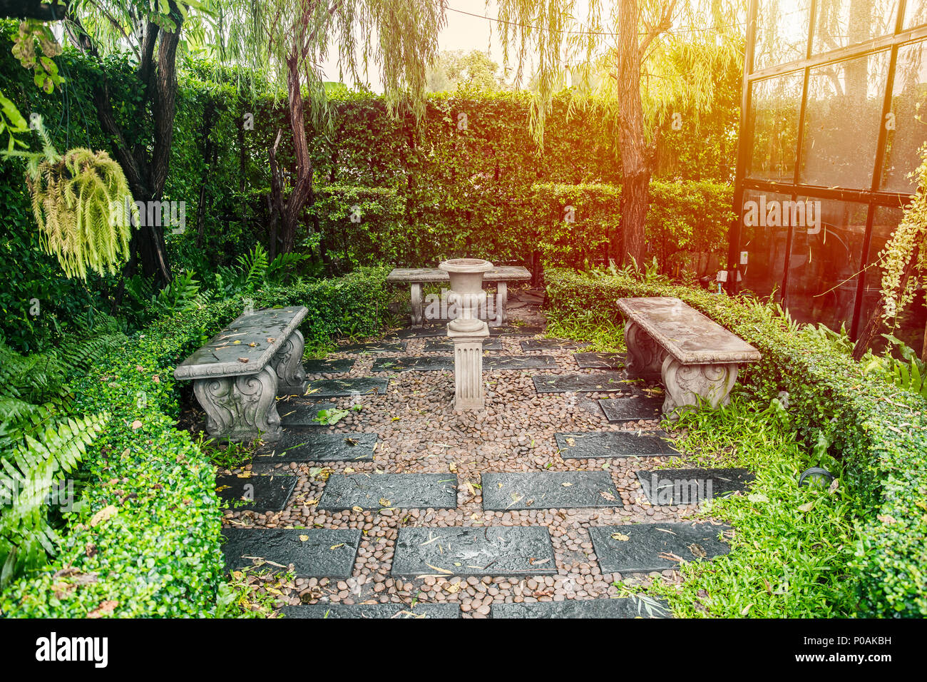 green park space with stone bench in the garden Stock Photo - Alamy