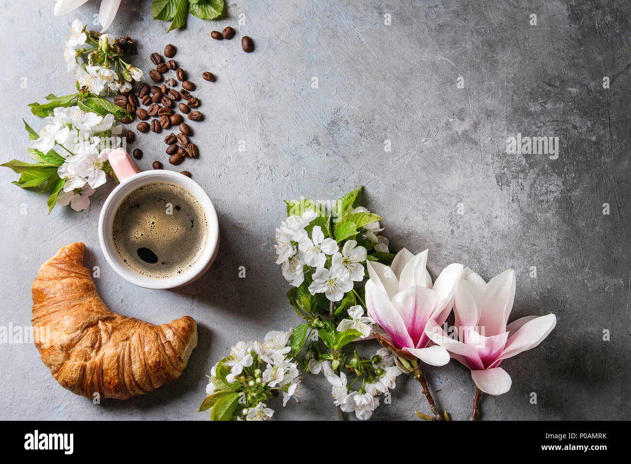 Coffee with spring flowers Stock Photo - Alamy