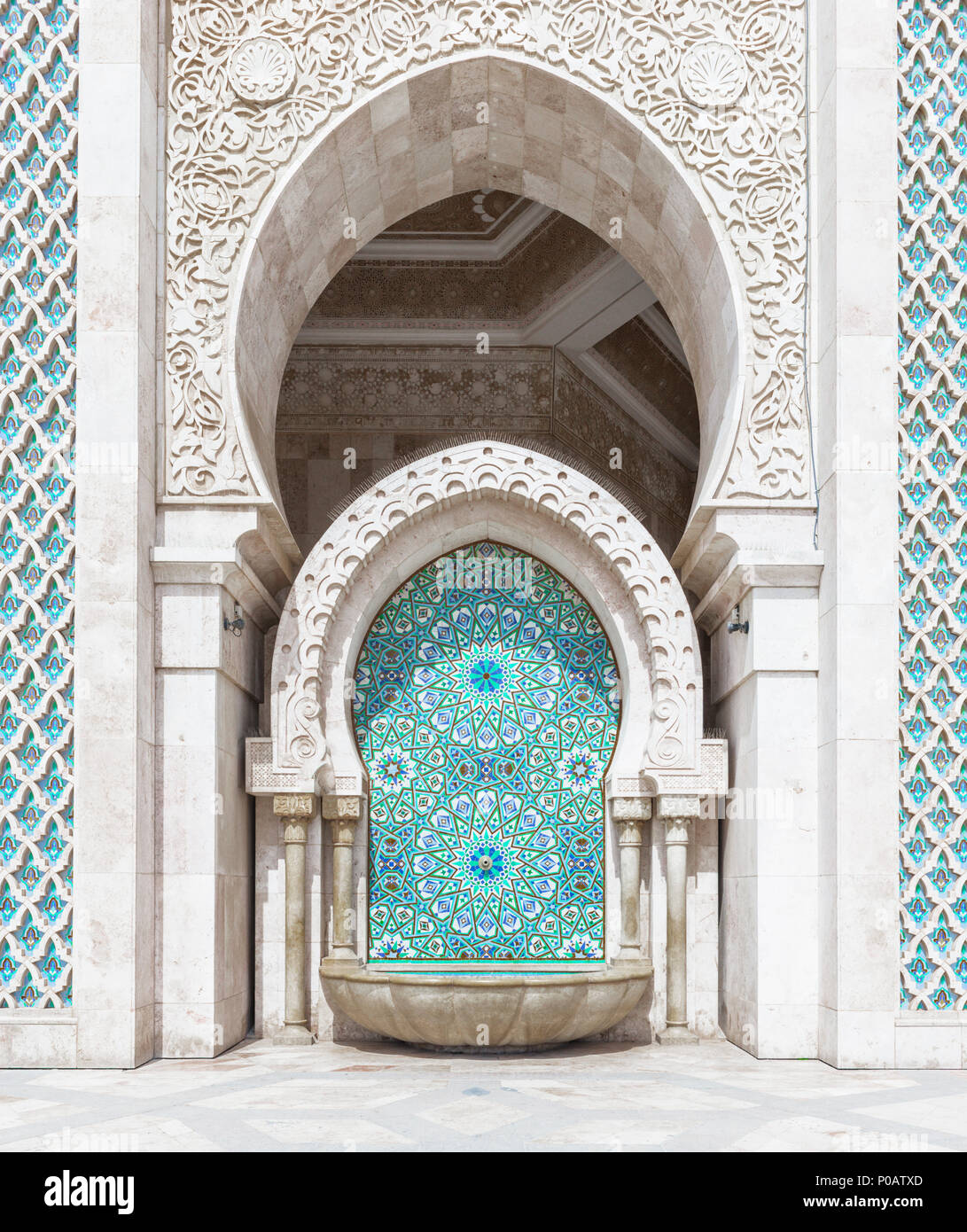 Decorated exterior wall, fountain with mosaic and ornament, Hassan II ...