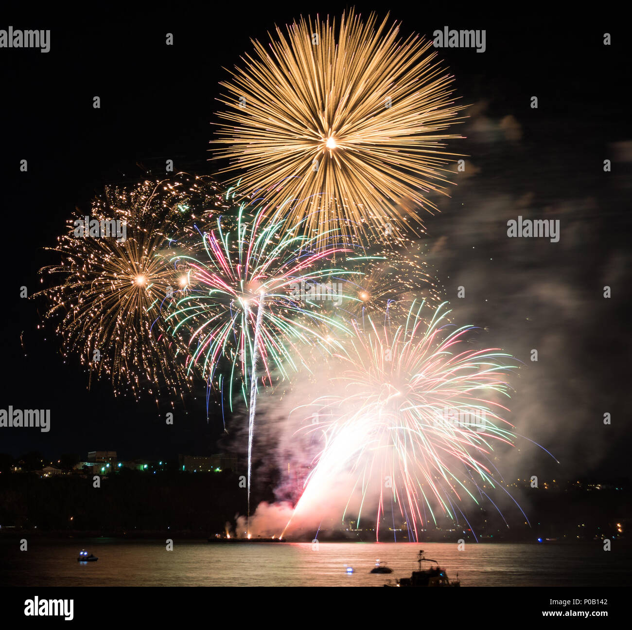 Fireworks display at Quebec City, launched from the St Lawrence River ...