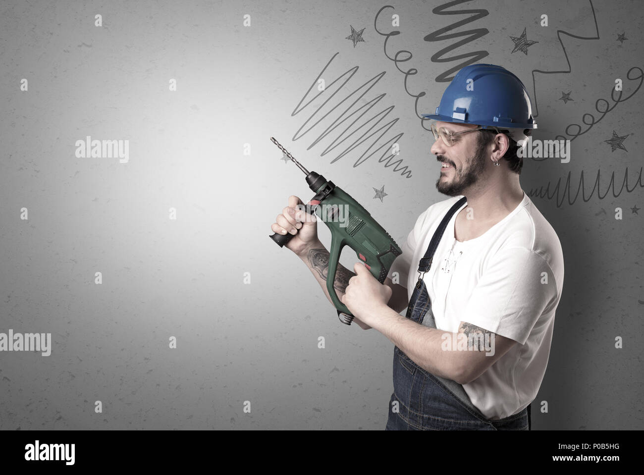 Handyman with tool in his hand and hand drawn lines above Stock Photo ...