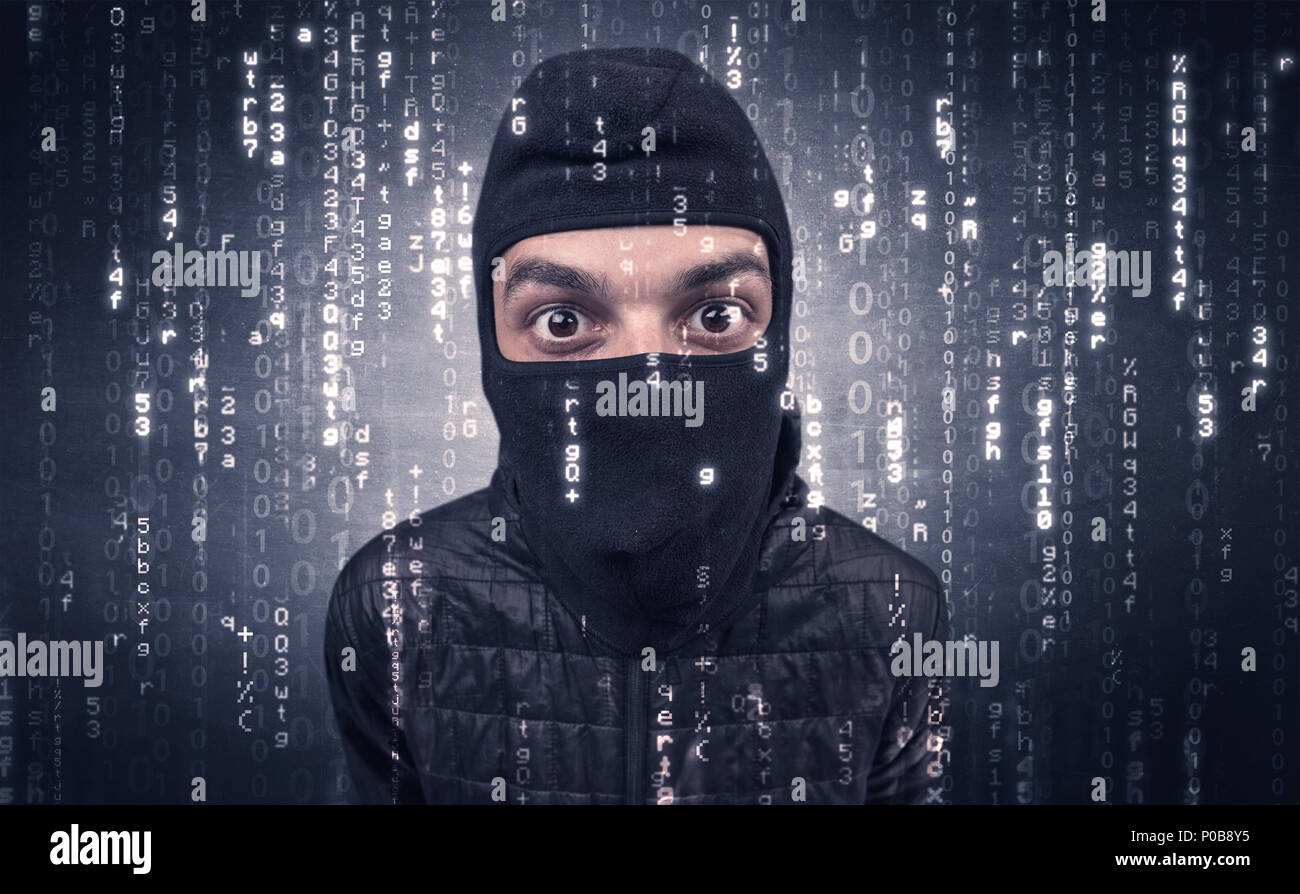 Burglar in action with encoded concept and his tools in his hand Stock ...