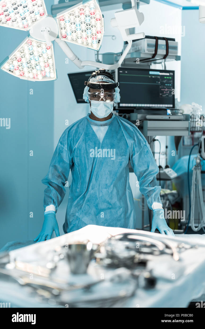 african american surgeon looking at camera in operating room Stock ...