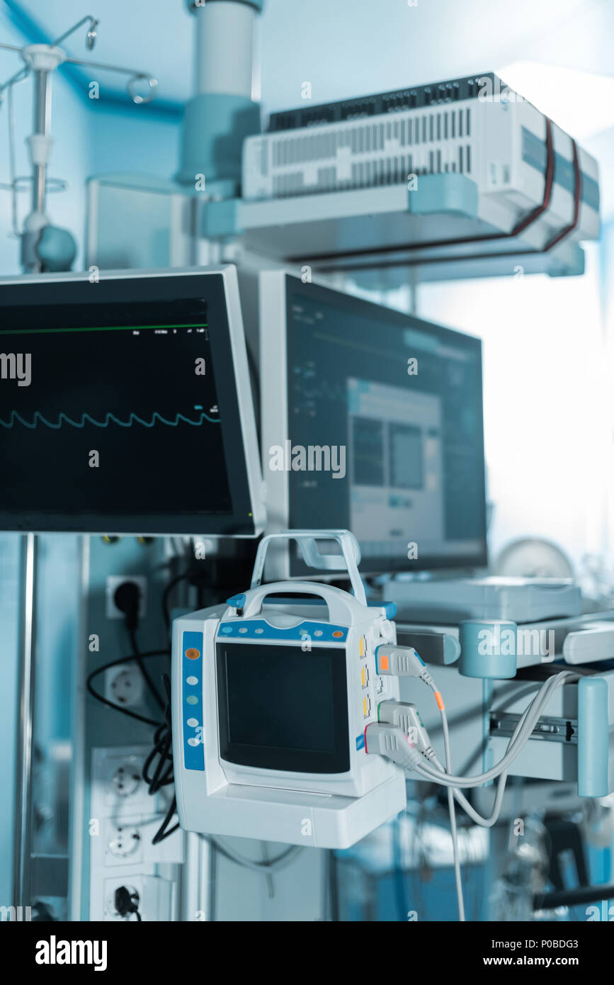 medical equipment with screens in surgery room Stock Photo - Alamy