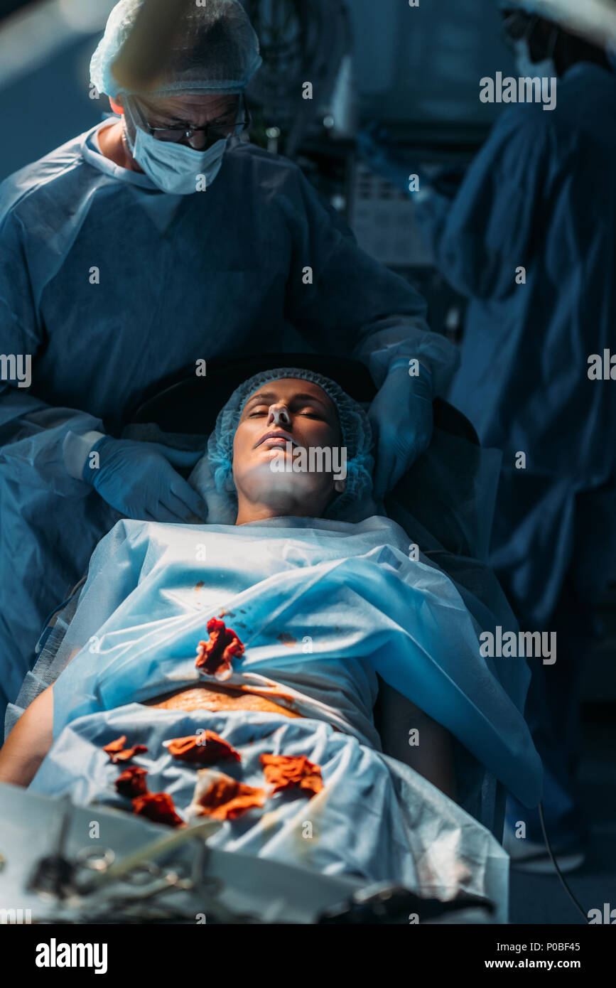 female patient during surgery in operating room Stock Photo - Alamy