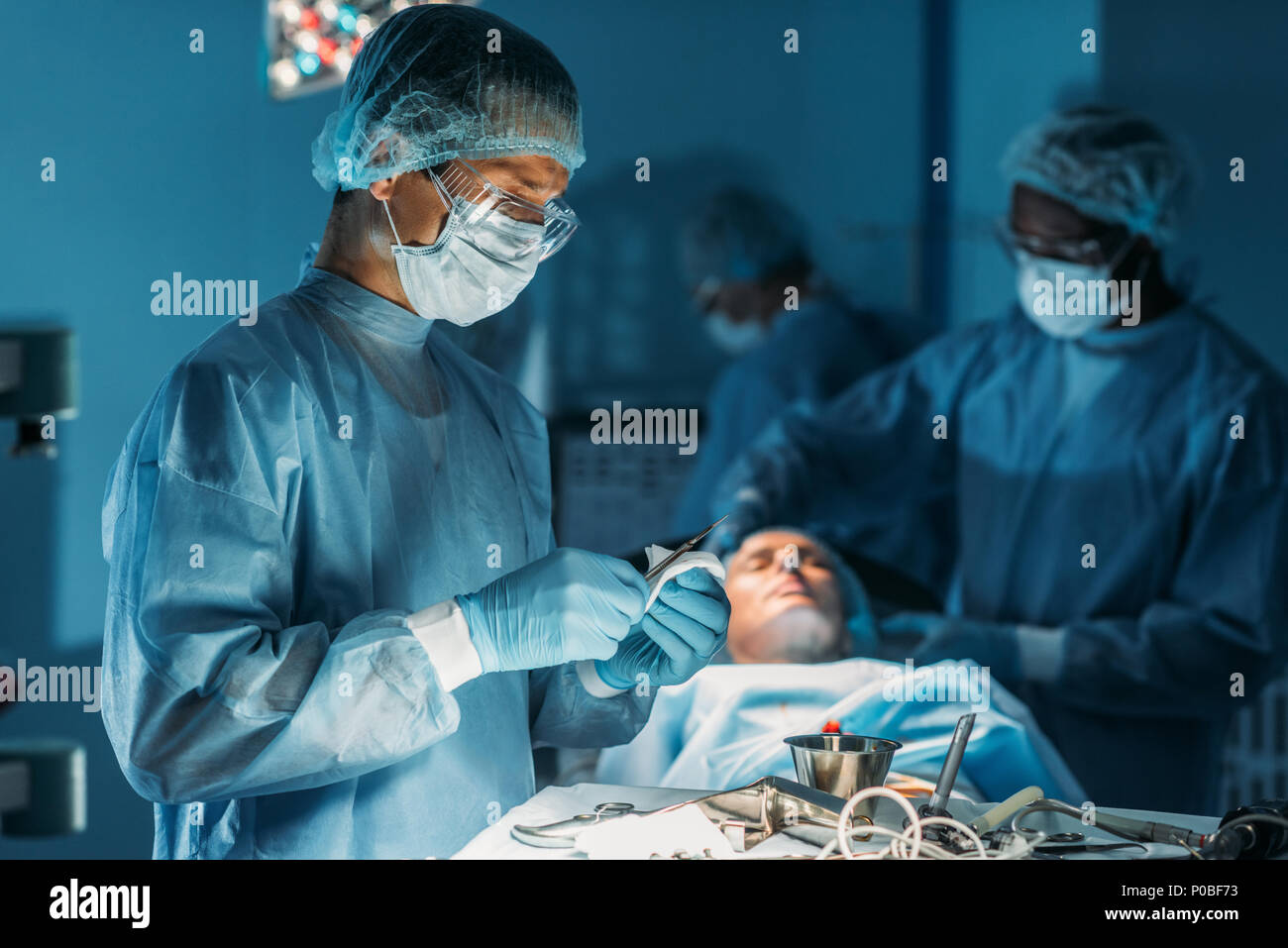 Black female surgeon operation hi-res stock photography and images - Alamy