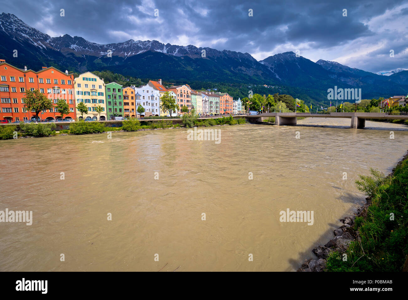 City of Innsbruck colorful Inn river waterfront panorama, Tyrol state ...