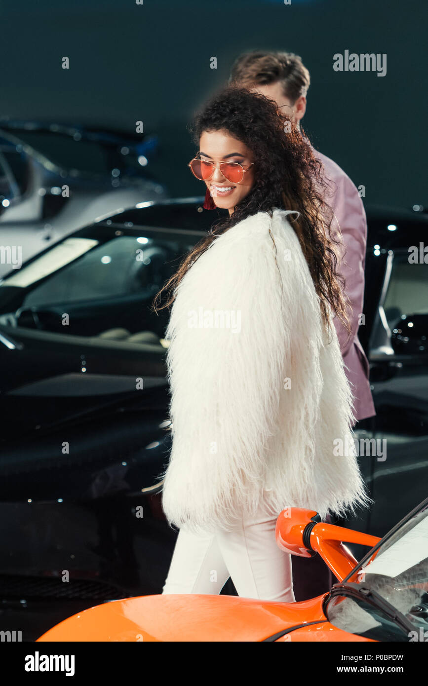 Young couple choosing new car hi-res stock photography and images - Alamy