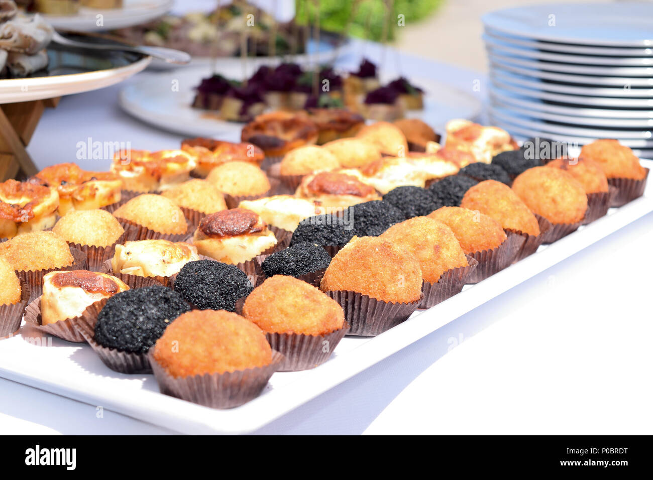 dish with arancini and other typical Sicilian snacks Stock Photo - Alamy