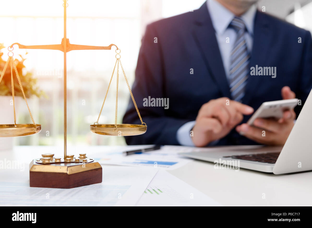 Justice symbol weight scales on table. Attorney working in office. Law ...