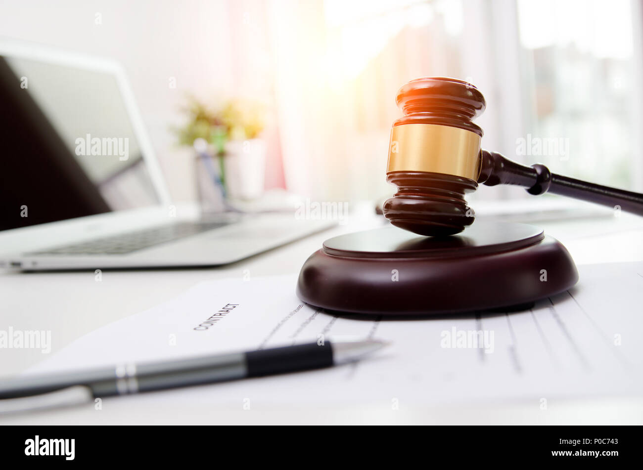 Wooden gavel at lawyer or attorney office. Law in technology, justice ...