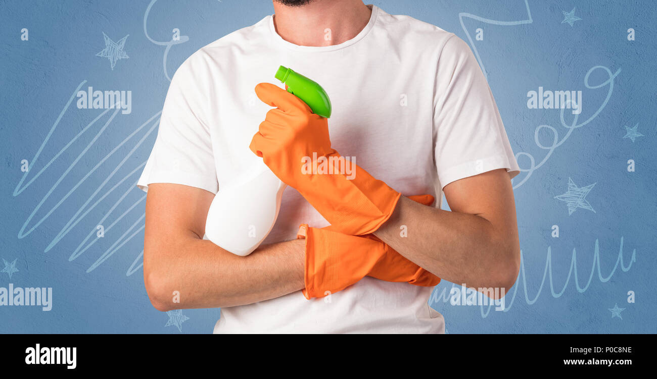 Swabber with orange rubber gloves and doodle concept on wallpaper Stock ...