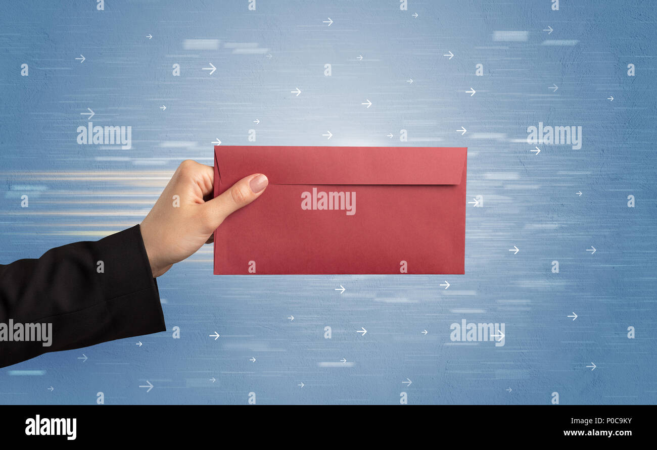 Female hand holding empty and full envelope with blue background and ...