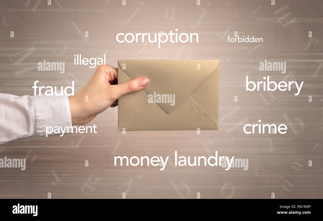 Female hand holding coloured and white envelope with beige background ...