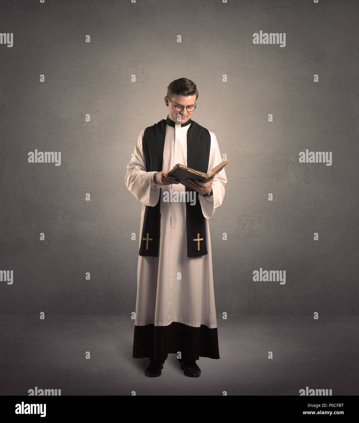 young priest in giving his blessing Stock Photo - Alamy