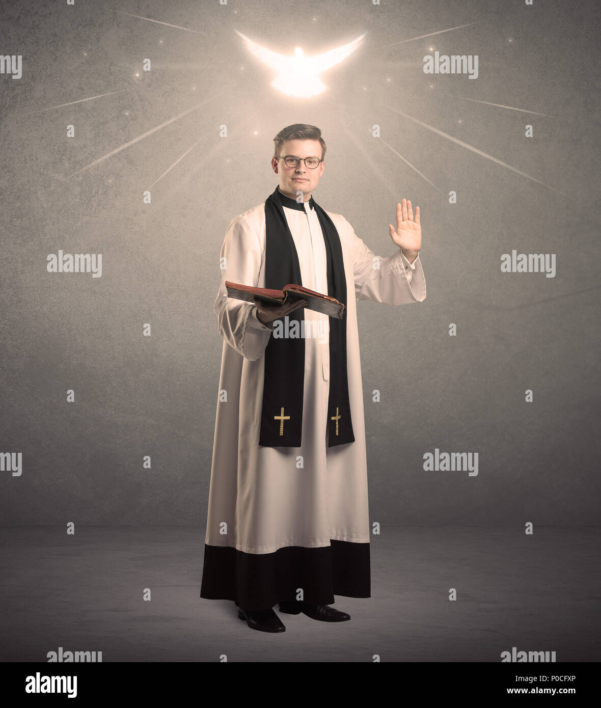 A holy priest reading a prayer from the holy bible with illustrated ...