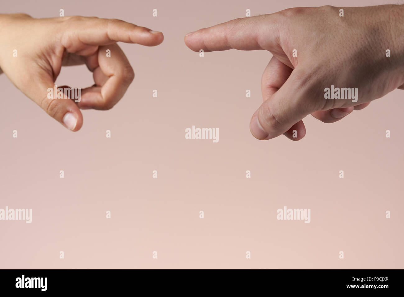 People help theme. One hand trying to touch finger of other Stock Photo ...