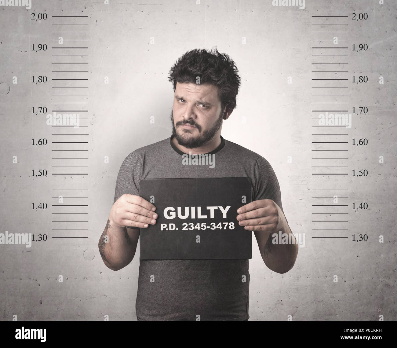 Caught guilty man with ID signs on his hand Stock Photo - Alamy