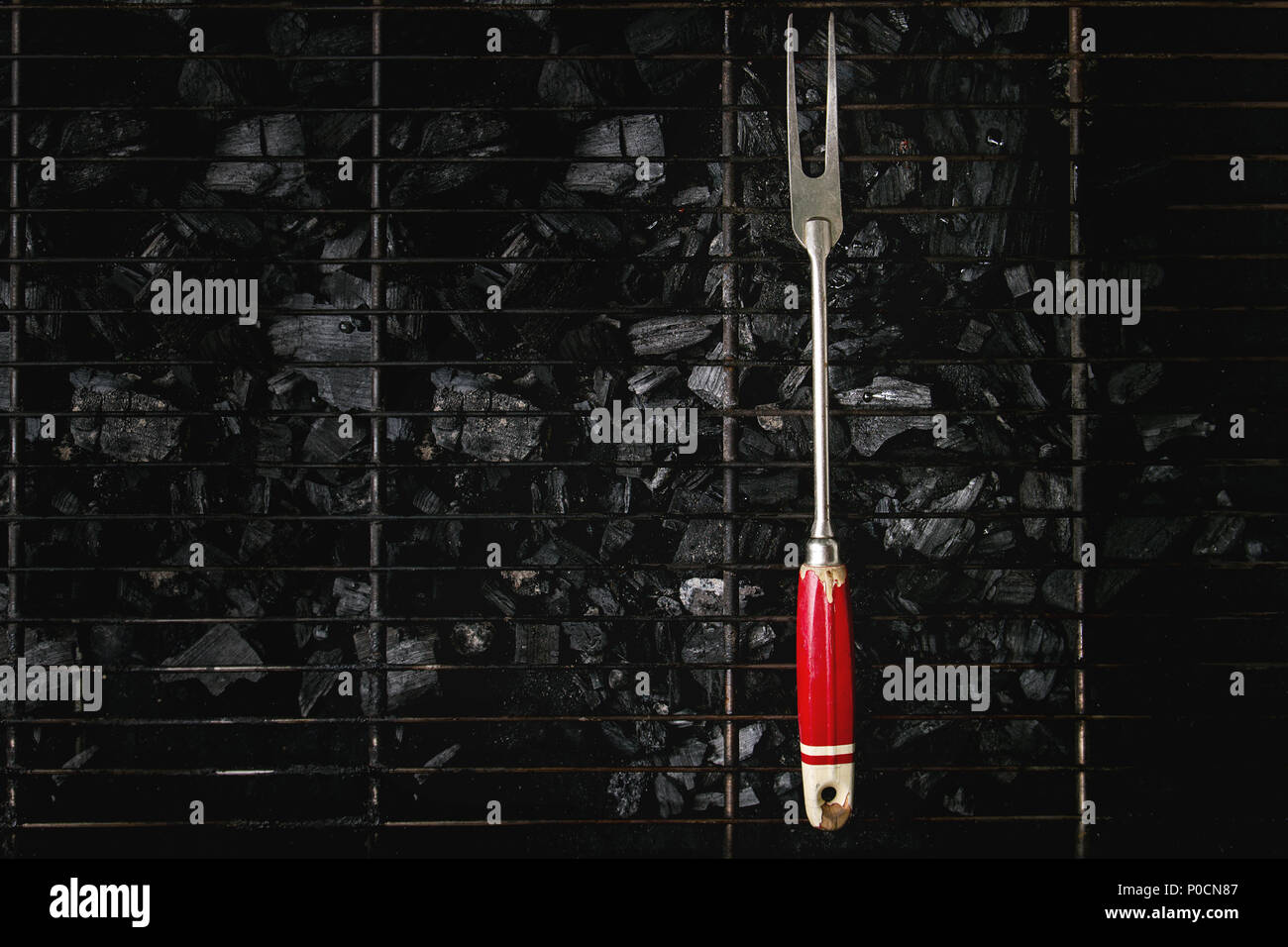 Barbeque fork on charcoal Stock Photo - Alamy