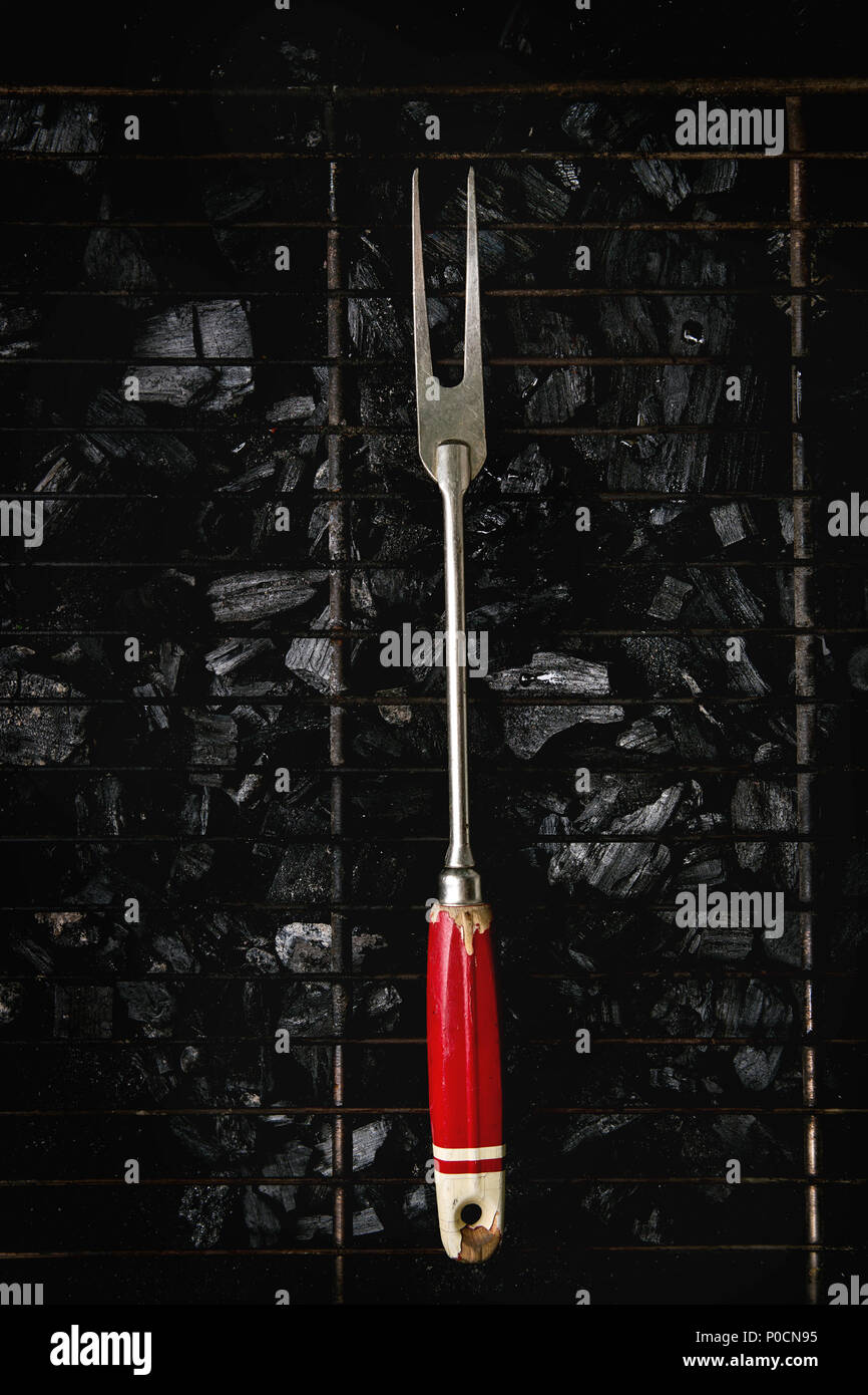 Barbeque fork on charcoal Stock Photo - Alamy