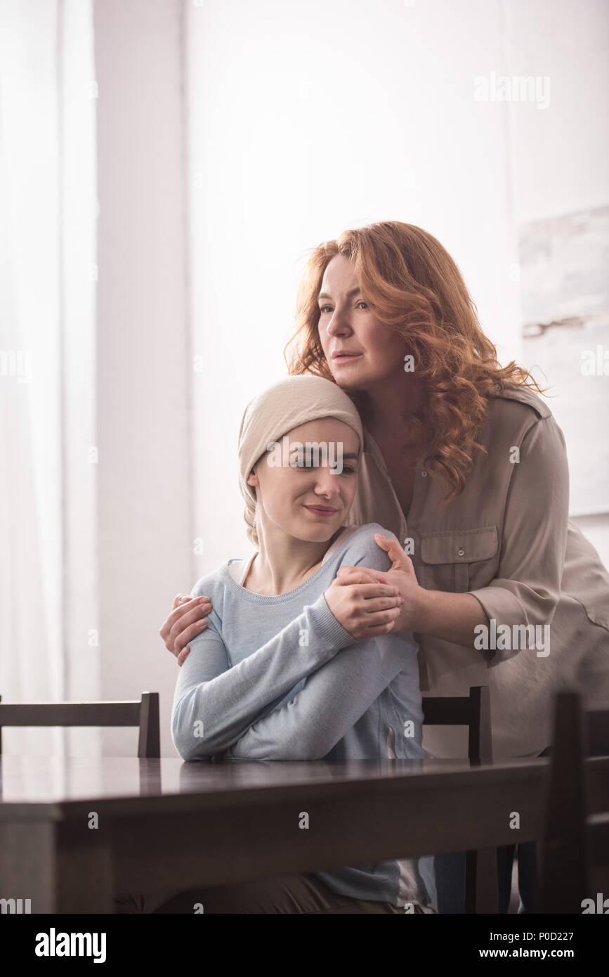 Woman Hugging Sick Daughter High Resolution Stock Photography and ...