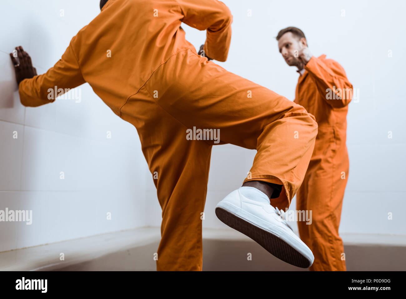 multicultural prisoners fighting in prison cell Stock Photo - Alamy
