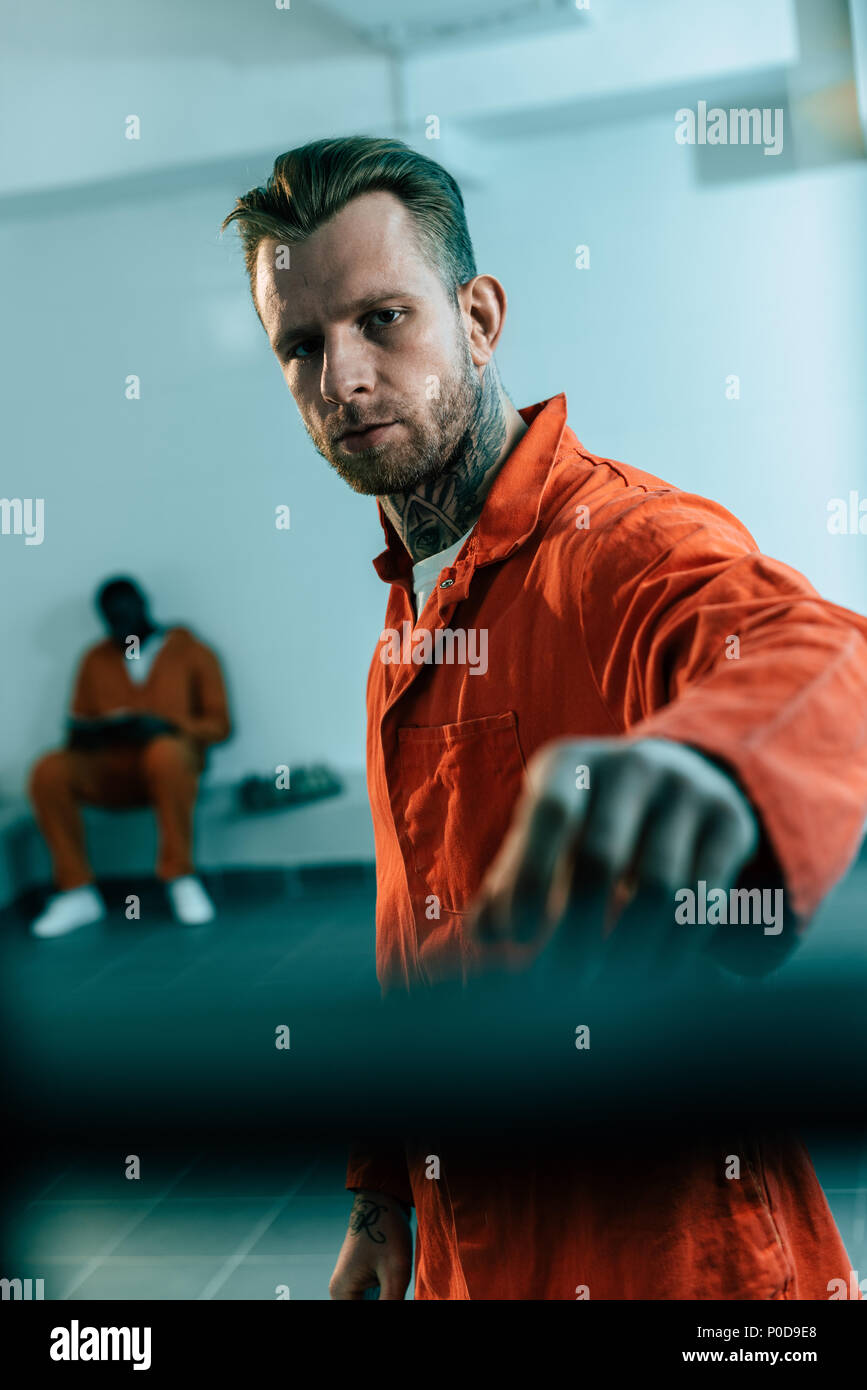 Prisoners behind bars hi-res stock photography and images - Alamy