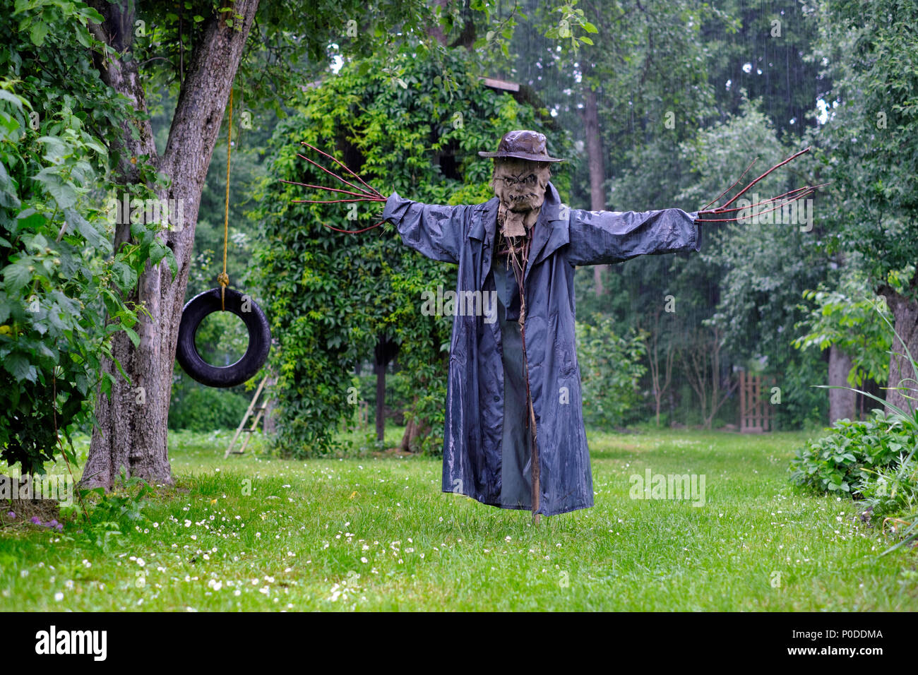 Scary scarecrow in a hat Stock Photo - Alamy