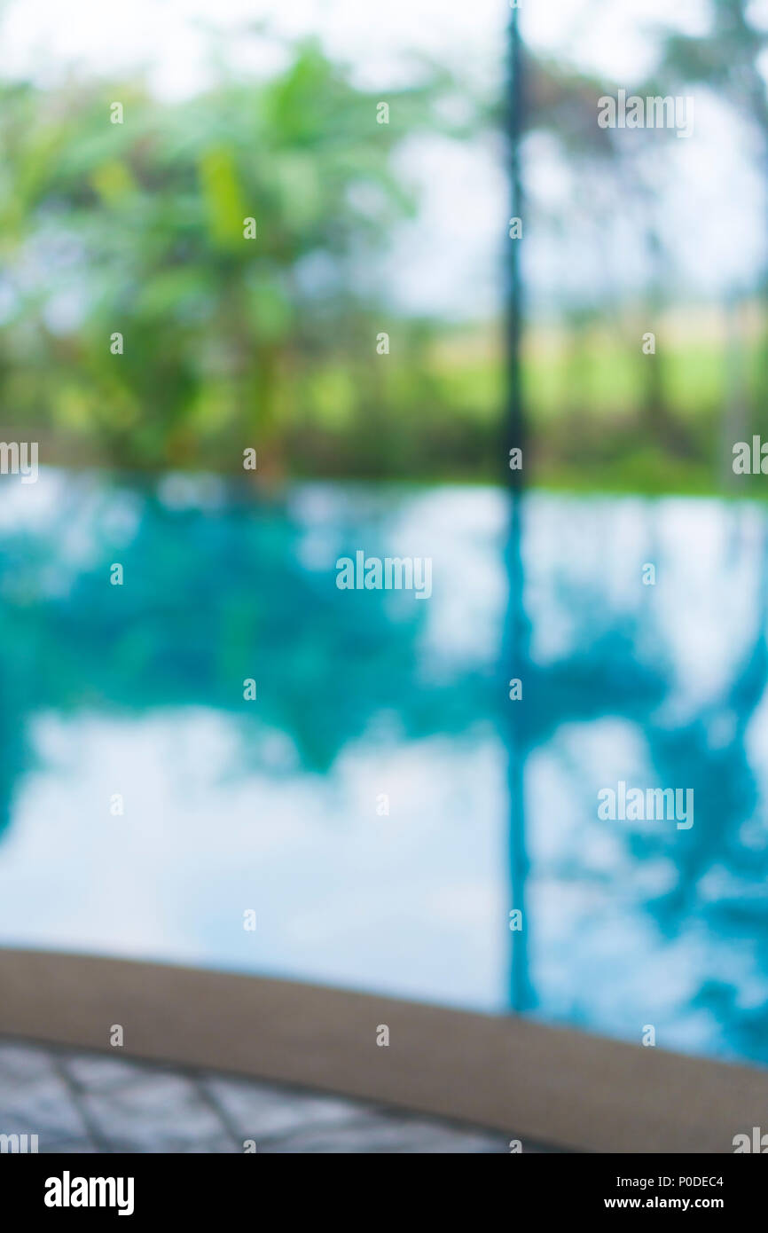blurry background of swimming pool view Stock Photo - Alamy